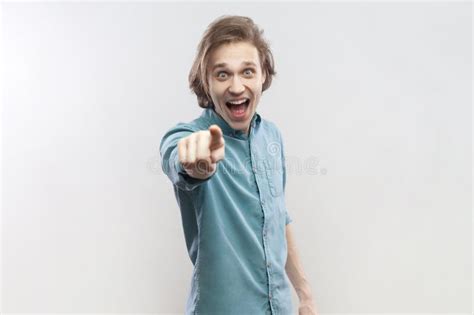 Surprised Astonished Shocked Young Man Standing Pointing At Camera