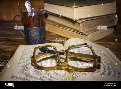 Old Books On A Woodentable Stock Photo Alamy