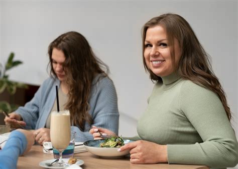 Free Photo Plus Size Female Friends Spending Time Together At A Restaurant