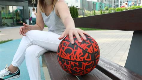 Young Woman Bouncing Basketball On Bench At Sports Ground Stock Footage Video Of Ball Outdoor