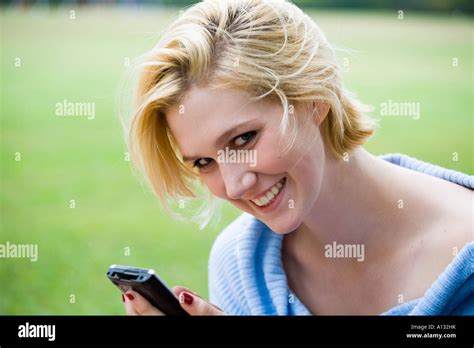 Girl Using PDA Stock Photo Alamy