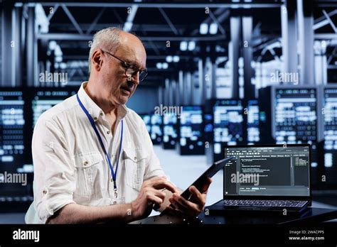 Senior Engineer Coding In High Tech Data Center Using Javascript