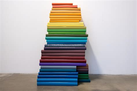 Rainbow Stack Of Books In A Quiet Library Premium Ai Generated Image