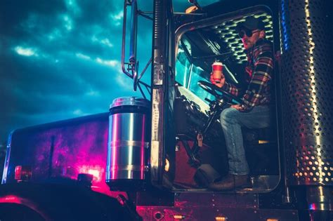 Premium Photo Trucker Driver Drinking A Coffee While On A Truck Stop