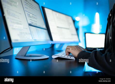 Hacker Using Computer To Write Exploit Stock Photo Alamy
