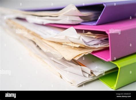 File Folder Binder Stack Of Multi Color On Table In Office Stock Photo Alamy