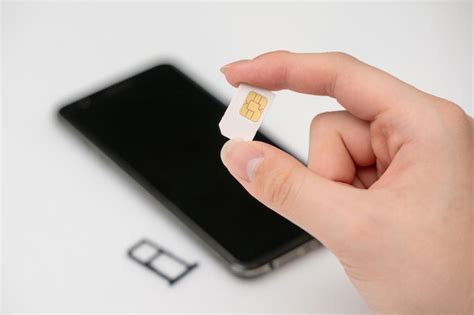 Premium Photo SIM Card Replacement In The Phone Mobile Simcard