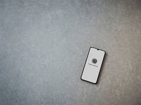 Launch Screen Of Google Authenticator App Displaying Logo On The Screen Photo Background And