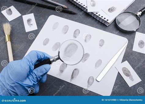Concept Of Criminal Investigation Investigator Wearing Blue Gloves And