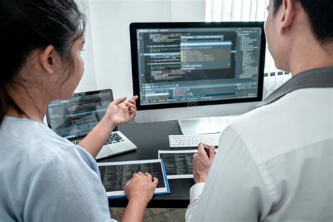 Team Of Developer Programmer Working On Coding Program Software