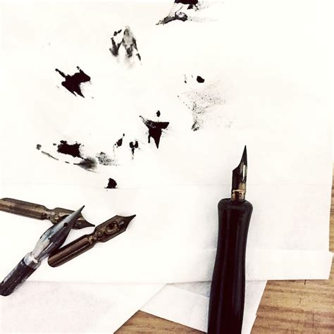 Premium Photo Fountain Pen And Nibs On Paper