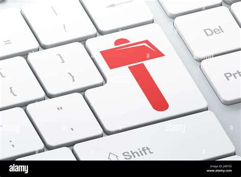 Constructing Concept Hammer On Computer Keyboard Background Stock