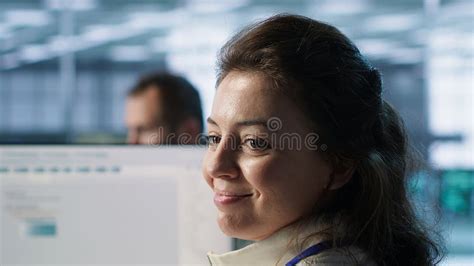 Smiling Woman At Pc Checking Servers Bottlenecks Leading To