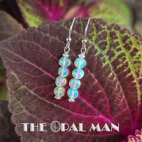 Falling Light Sterling Silver Dangle Earrings With Ethiopian Opals