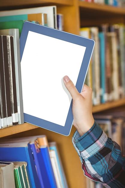 Premium Photo Students Hand Putting Table In Bookshelf