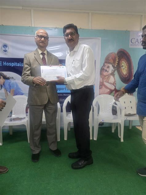 Receiving Certificate At Care Hospital High Tech City Md Shafiuddin