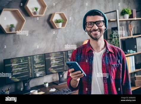 Photo Of Happy Smiling Coder Dressed Hat Glasses Smiling Creating Ecommerce Eshop Application