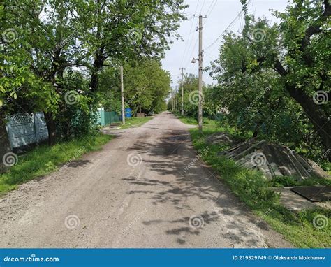Rural Street In Spring Houses Pillars Road Trees Stock Image Image Of