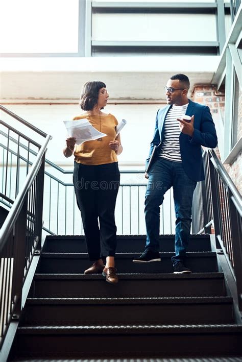 Employees Stairs And Paper For Teamwork Talking Conversation And Creative Planning In Office