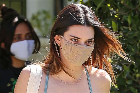 Kendall Jenner Plays Tennis In A Lime Green Sports Bra Pleated Skirt Footwear News
