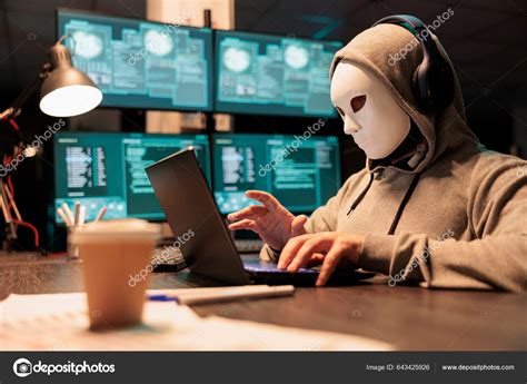 Hacker Mask Hood Breaking Security Server Installing Virus Create