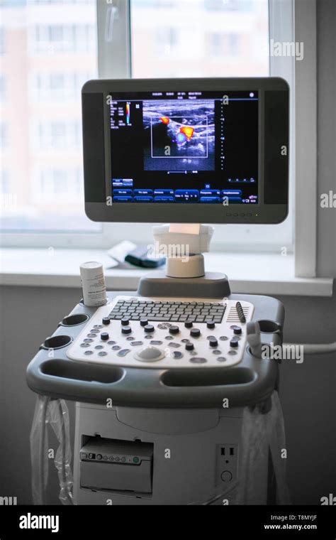 Close Up In Backlit High Tech Ultrasound Machine Analysis Diagnosis Of The Condition Of The