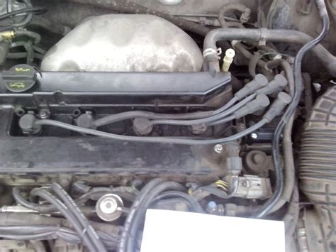 Замена катушки зажигания — Ford Mondeo III, 2 л, 2003 года ...