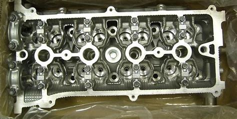 Установка болтов крепления головки блока цилиндров Toyota Camry 2001 - 2006