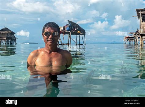Portrait Of Bajau Laut Or Sea Gypsy Man With Scuba Glass In Maiga