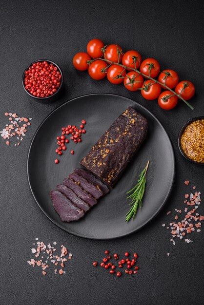 Premium Photo | Delicious smoked armenian basturma with spices and herbs