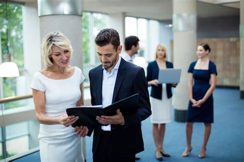 Premium Photo | Business executives interacting with each other