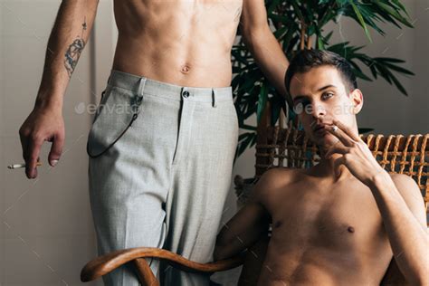 Stylish Shirtless Gay Couple Posing Stock Photo By Addictive Stock