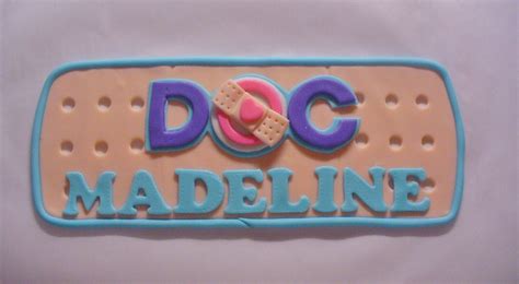 Edible Fondant DOC MCSTUFFINS Inspired Logo Band Aid Cake