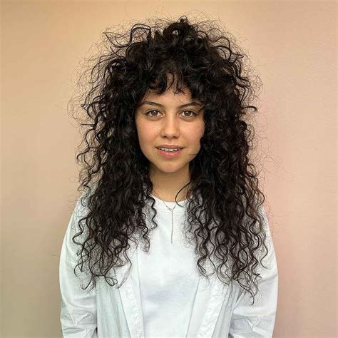 26 Most Flattering Wolf Cuts For Curly Hair