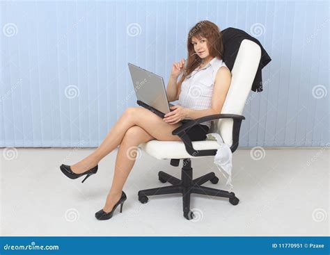 Young Sexual Girl Secretary Sits In An Armchair Stock Image Image