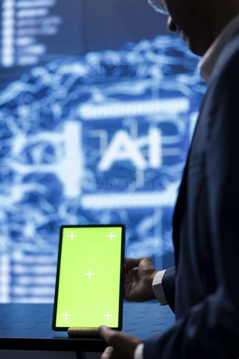 technician in startup doing advancements in ai field using chroma key