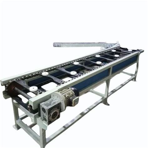 Stainless Steel Belt Fixture Conveyor System For Material Handling Capacity 100 Kgfeet At