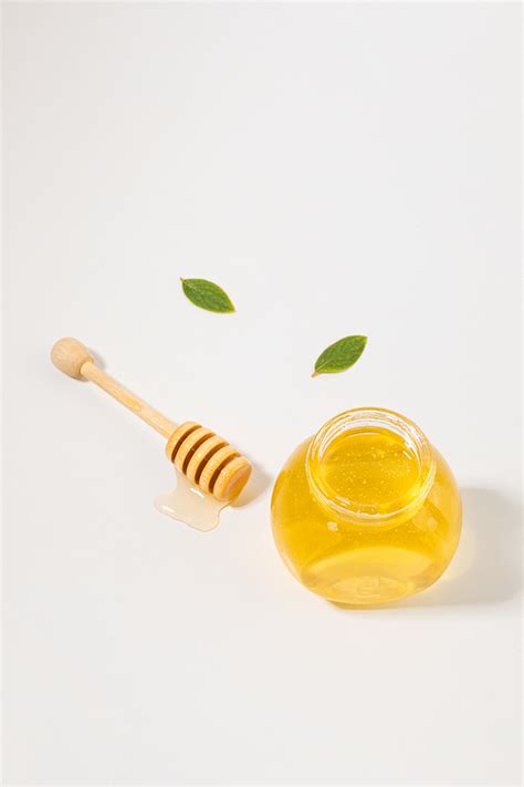 유토이미지 꿀병에 담긴 꿀과 허니디퍼 사진 이미지