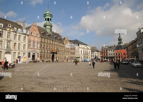 The Old Square The Grand Place And The Gothic Style City Hall With