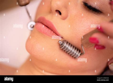 Face Rollers Applied In Madero Massage Therapy Woman Having A Madero