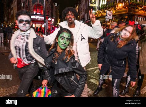 People In Fancy Dress Celebrating Halloween Old Compton Street Soho