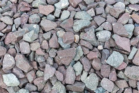 Piedras Agrietadas Del Granito Listas Para La Construcción Imagen De