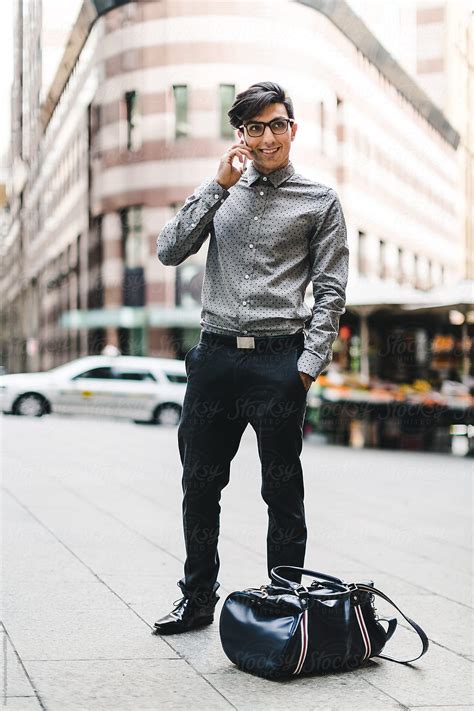 Businessman Using Mobile Phone By Stocksy Contributor Mauro Grigollo Stocksy