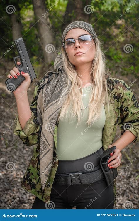 Attractive Female Army Soldier Posing With Gun Woman With Weapon Stock