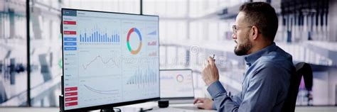 Looking At KPI Data Stock Photo Image Of Finance Office