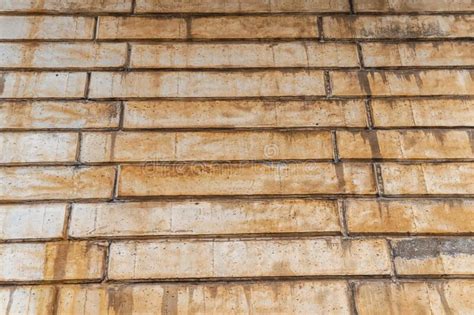 The Texture Of The Wall Of Concrete Blocks With Traces Of Rust Stock