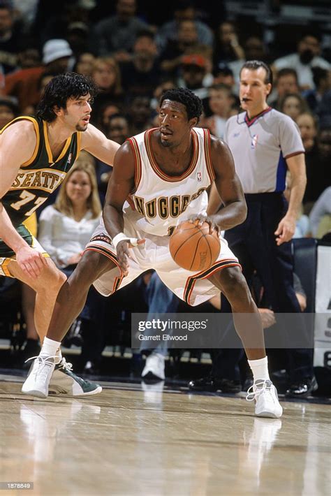 Donnell Harvey Of The Denver Nuggets Looks To Drive Against Vladimir