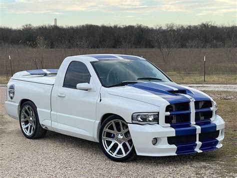 Custom Dodge Pickup Truck With Blue Stripes Ram Charger Startech