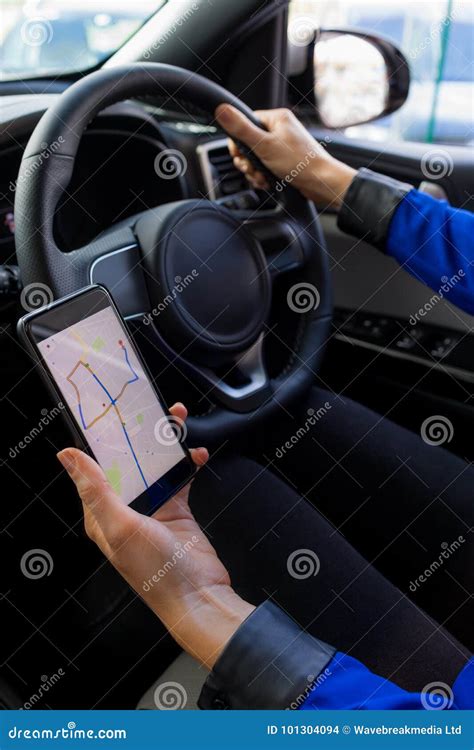 Close Up Of Female Customer Using Phone During Test Drive Stock Photo Image Of Land Adult