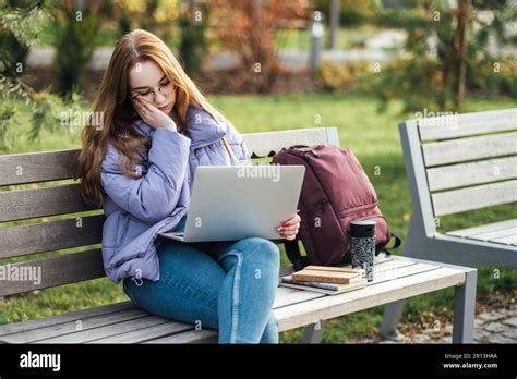 Managing Stress In High Babe Stressed And Tired Babe Girl With Laptop Outdoors Difficult